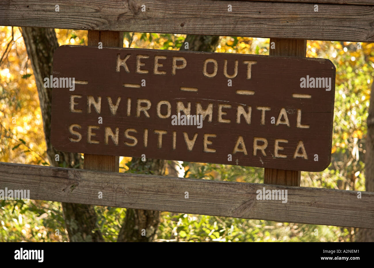 A sign warning about environmental sensitive area at lake Eaton ...