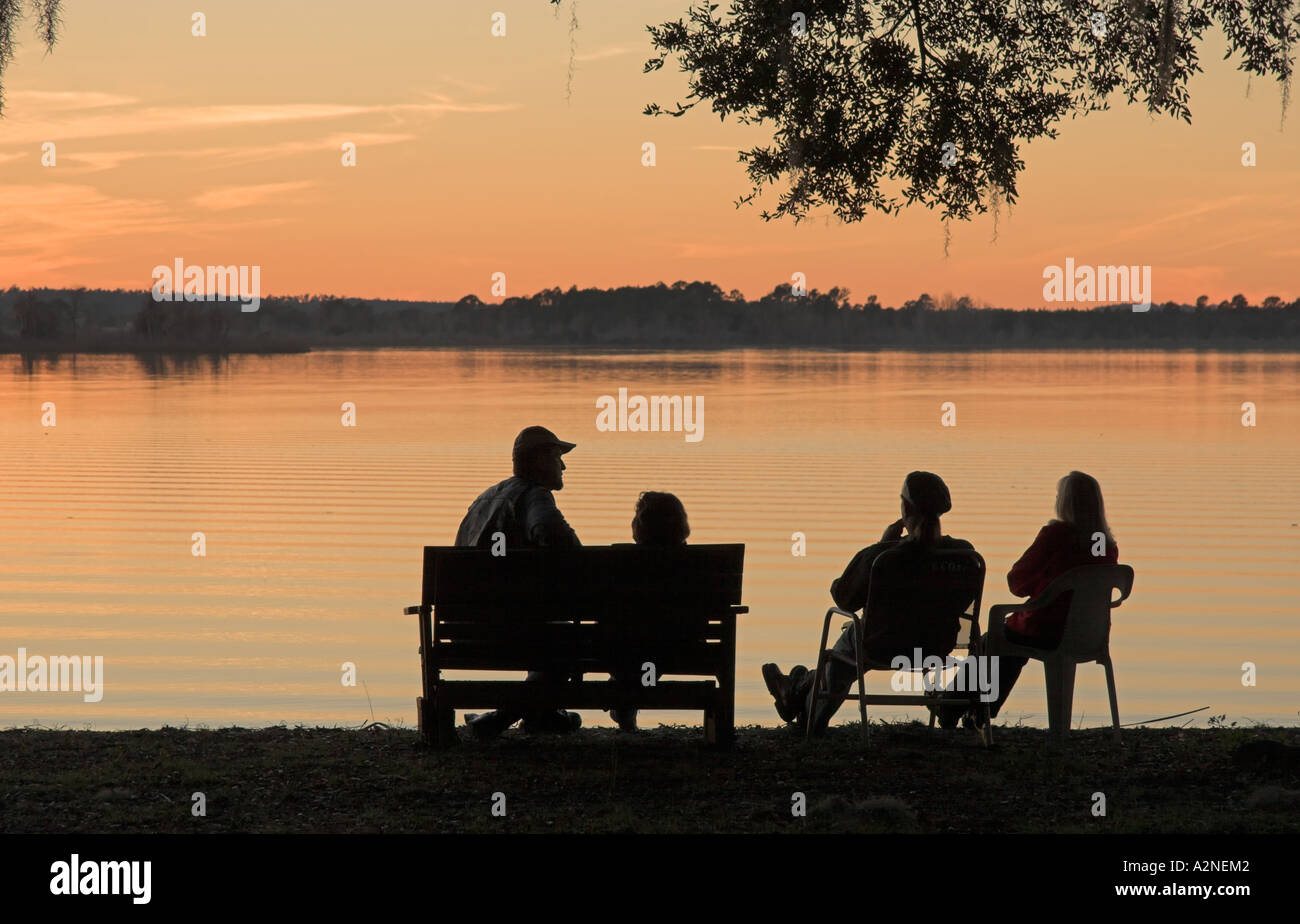 Two couples enjoying sunset at a lake in Central Florida, USA Stock ...