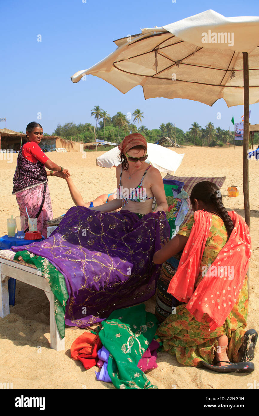 INDIA NORTH GOA A BEACH TRADER ON CANDOLIM BEACH Stock Photo - Alamy