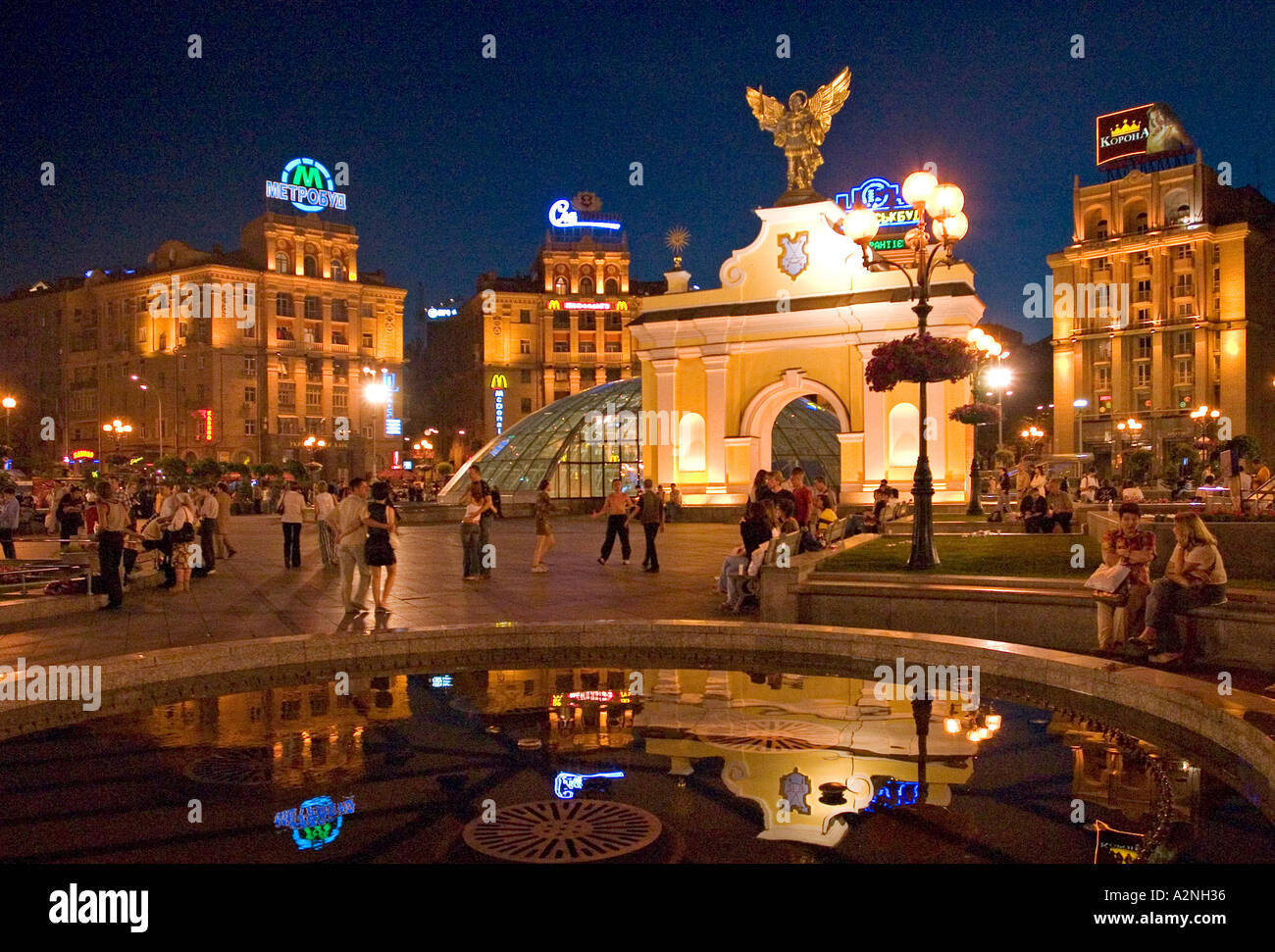 Ukraine Kiev Place of Independence people tourists visitors sit on the ...