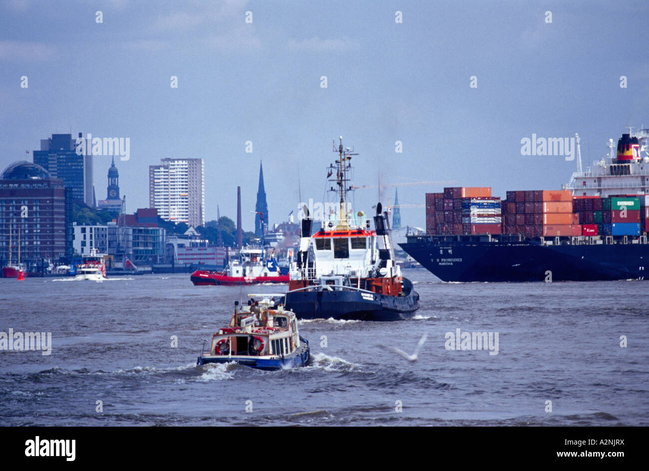 Tug boat in river, Elbe River, Hamburg, Germany Stock Photo - Alamy