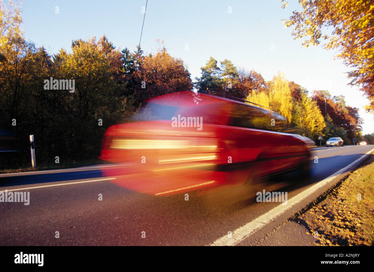 Car moving on road Stock Photo - Alamy