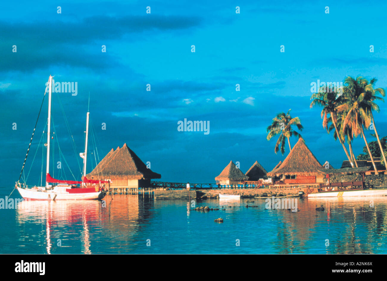 Boat at a resort on the coast, Moorea, French Polynesia Stock Photo - Alamy