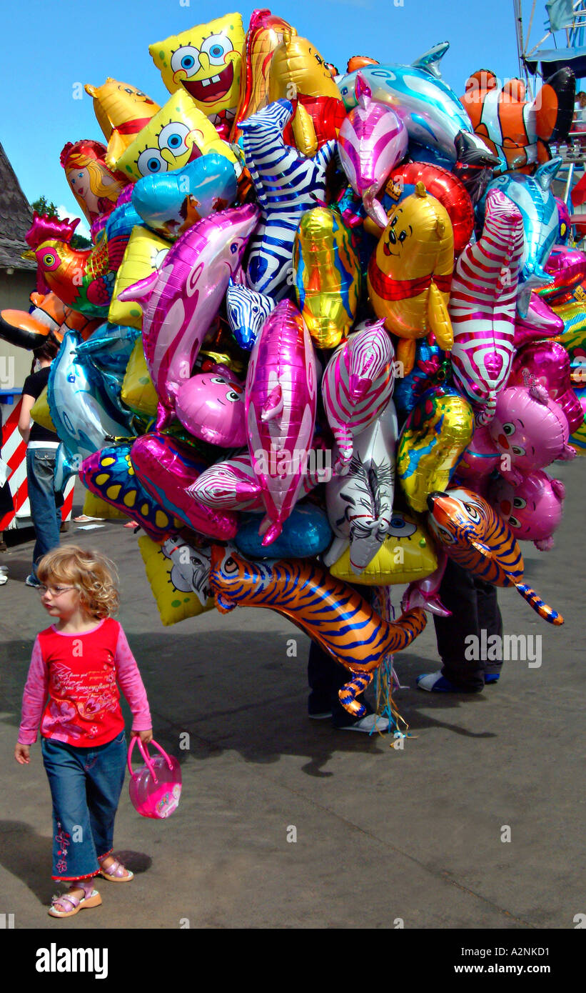 Brightly coloured funfair rides hi-res stock photography and images - Alamy