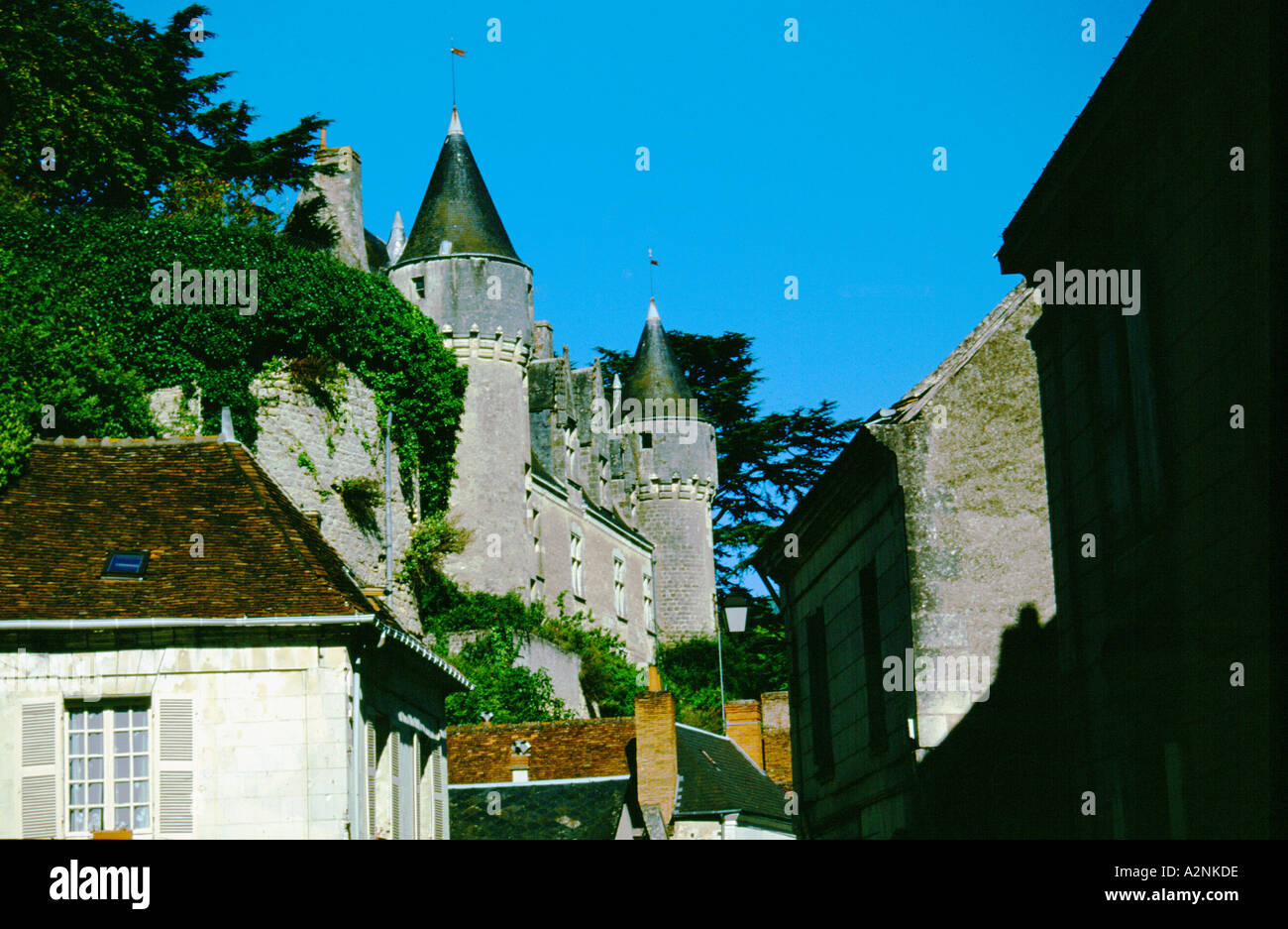 castle overlooking village Stock Photo - Alamy