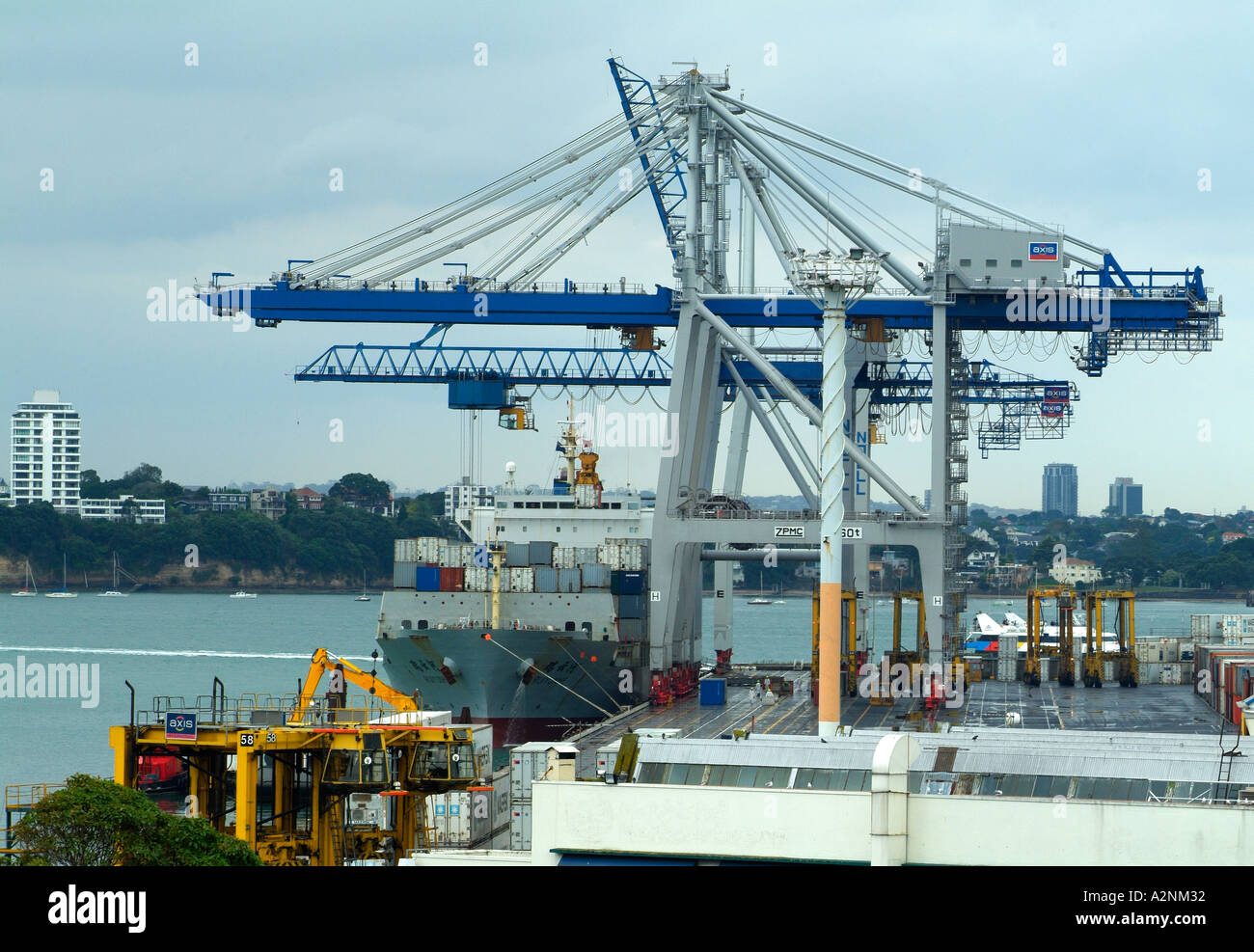 Port of Auckland docks with container crane gantries ship unloading ...