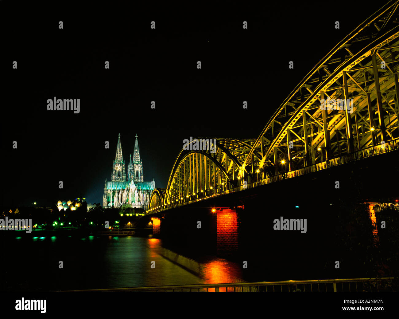 Bridge across river with cathedral in background, Rhein River, Cologne ...