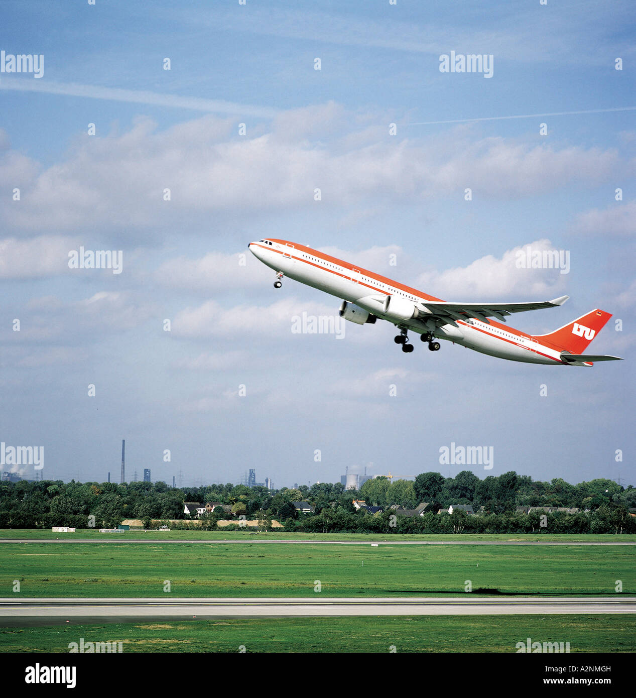 Airplane taking off from runway Stock Photo - Alamy