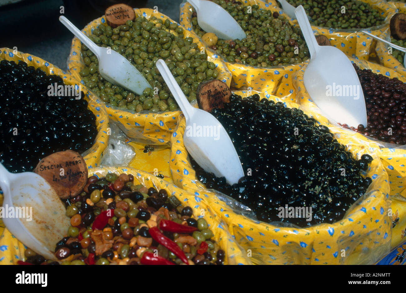 Fruits and vegetables in bags with scoops at market, France Stock Photo ...