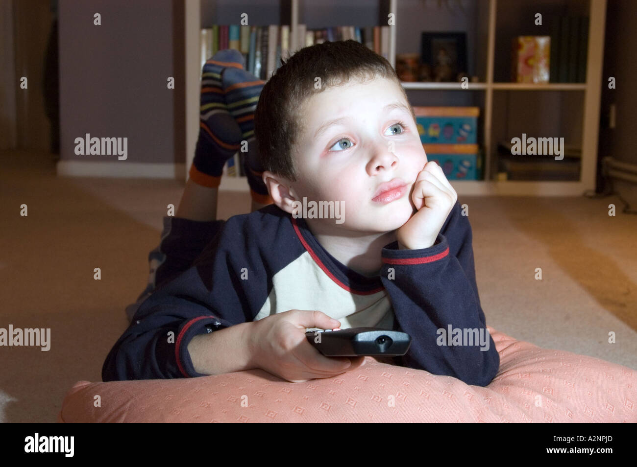 Young boy watching television at home England UK Stock Photo - Alamy