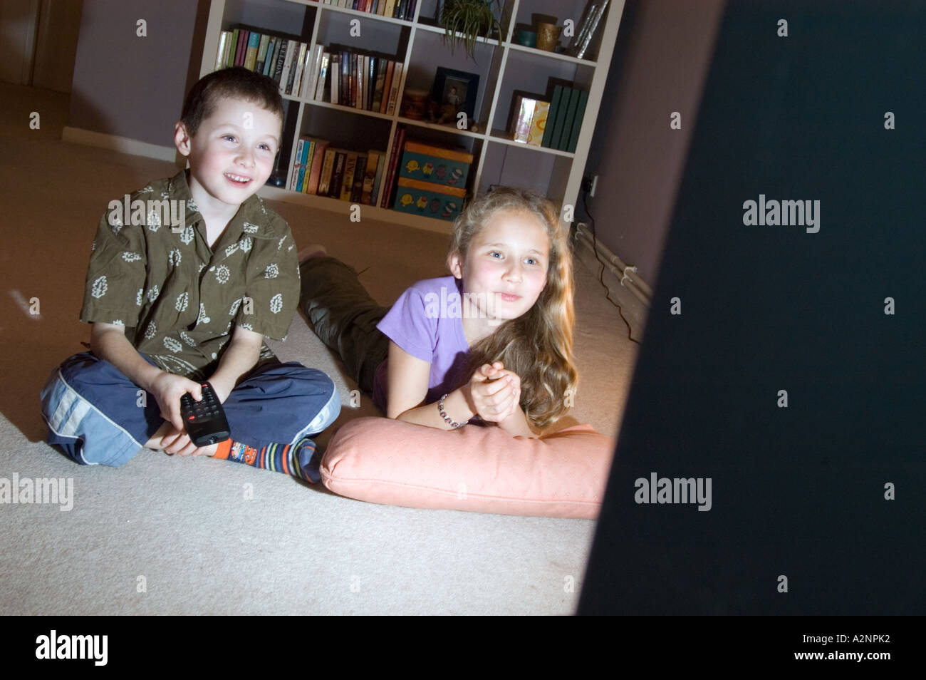 Children watching television at home Stock Photo - Alamy