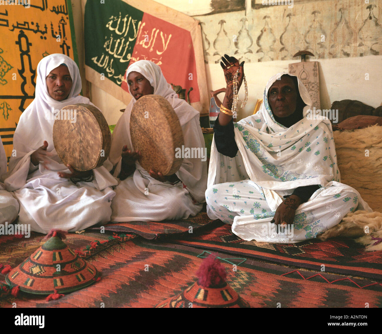 A group of women in Sabonabe are performing Sufi music with their ...