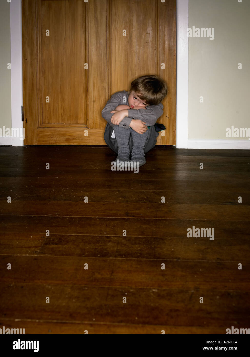 School boy sad alone uniform hi-res stock photography and images - Alamy