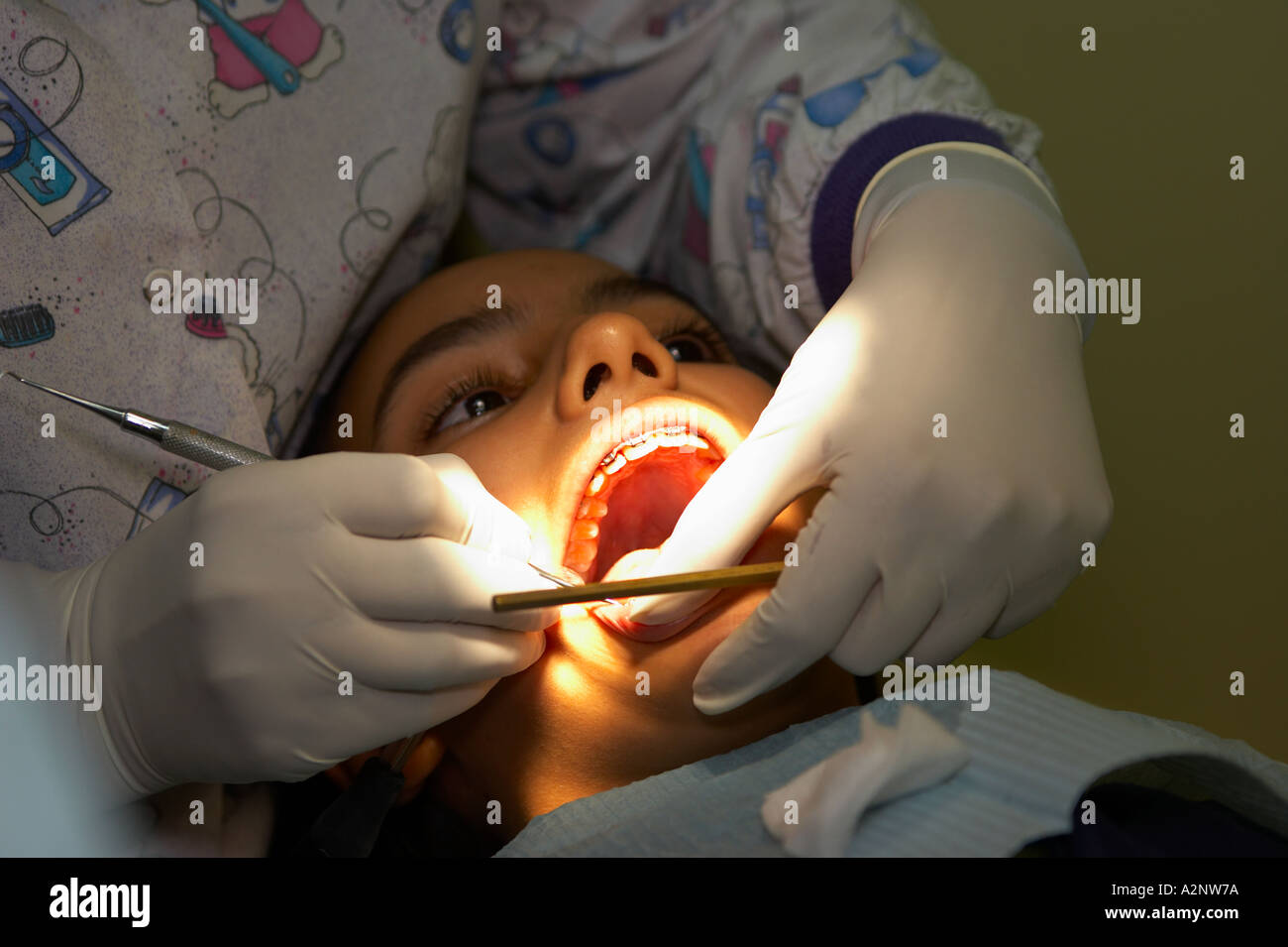 Manual dental cleaning Stock Photo - Alamy
