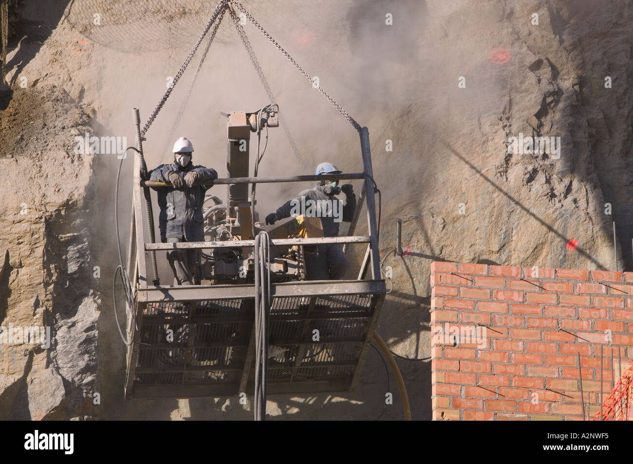 Construction workers wearing face masks hi-res stock photography and ...