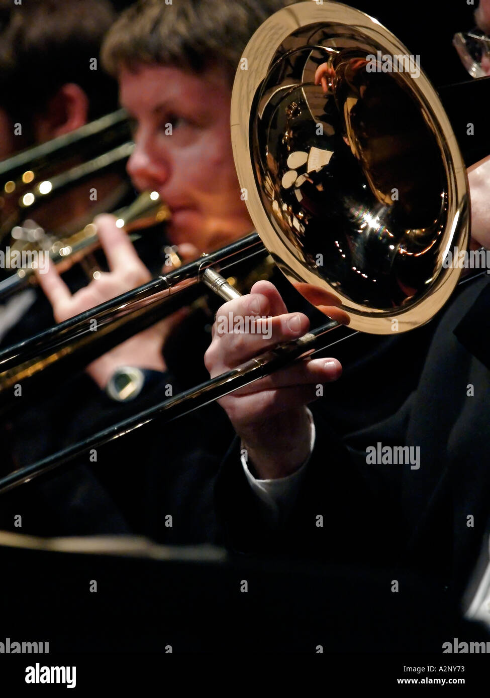Trombone section in concert performance Stock Photo - Alamy