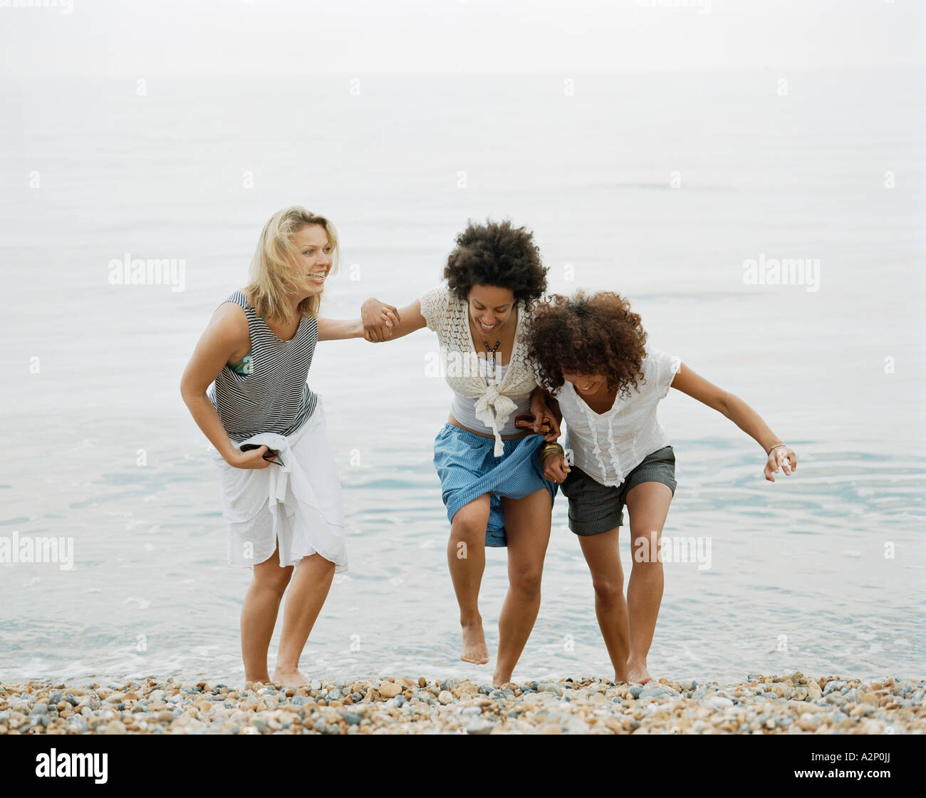 Friends at the beach Stock Photo - Alamy