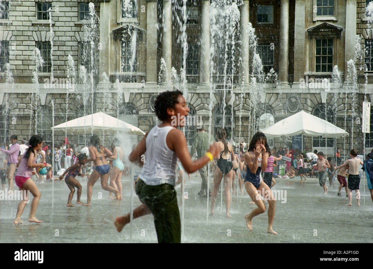 London, UK. Water jets at Somerset House, summer heatwave Stock Photo ...