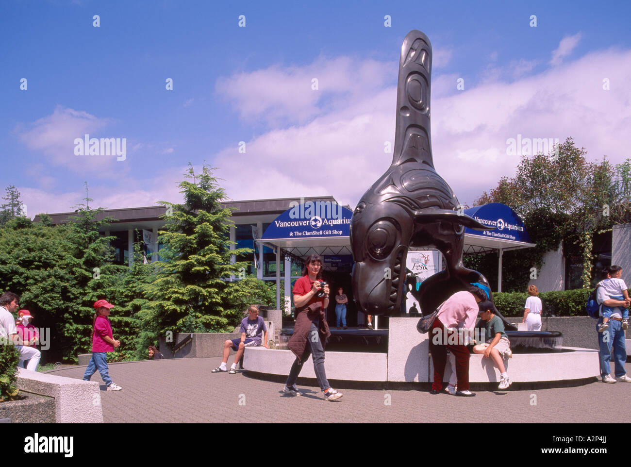 Tourists at the Haida Killer Whale Sculpture at the Vancouver Aquarium ...