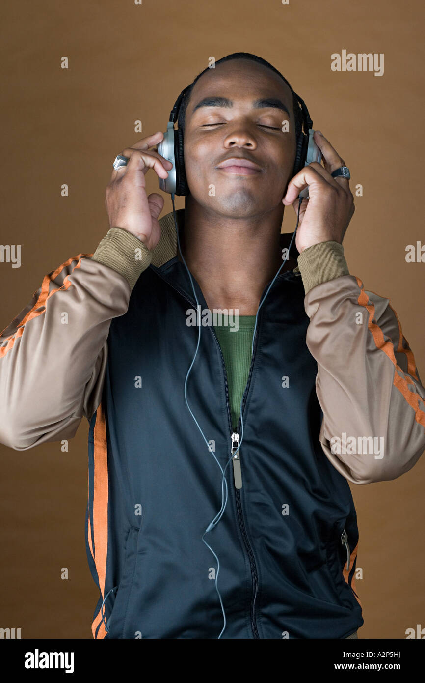 Man listening to music Stock Photo - Alamy