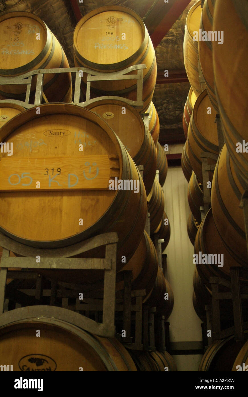 wine barrels in a winery storage cellar Stock Photo - Alamy