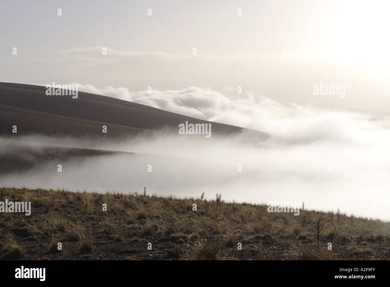 morning mist in hilly landscape in back-light, Turkey, Konya Stock ...