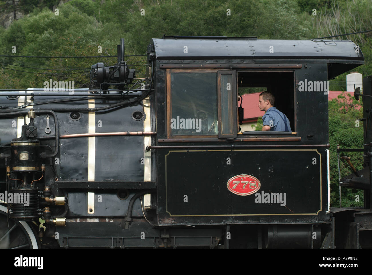 Driver on the Kingston Flyer steam train in New Zealand Stock Photo - Alamy