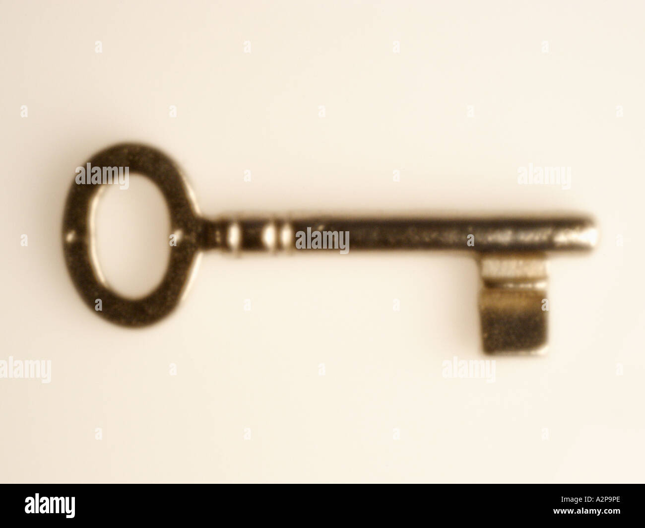 Skeleton key on white background - soft focus shot with pinhole camera ...