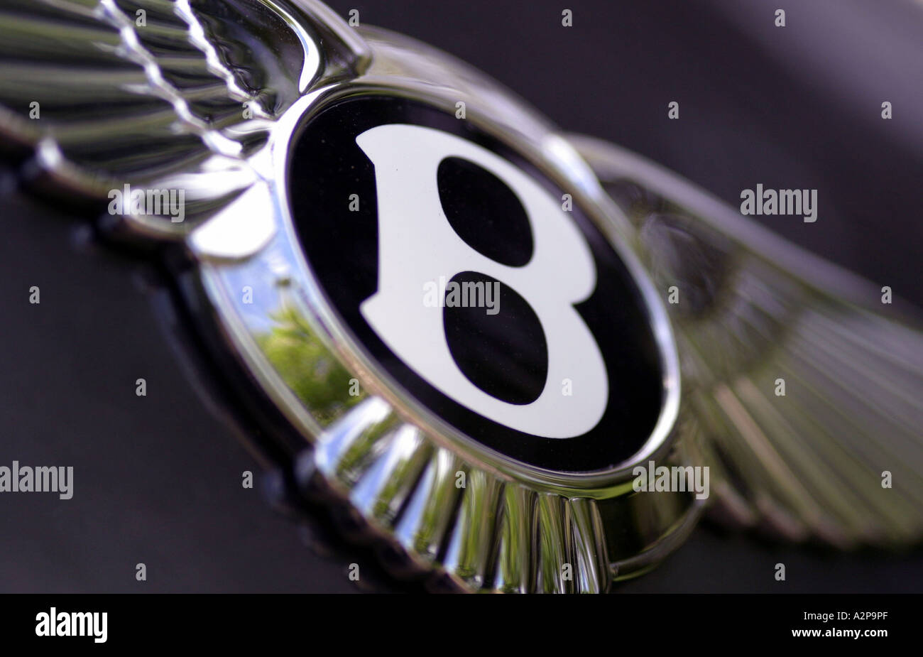 Bentley badge on a turbo Stock Photo - Alamy