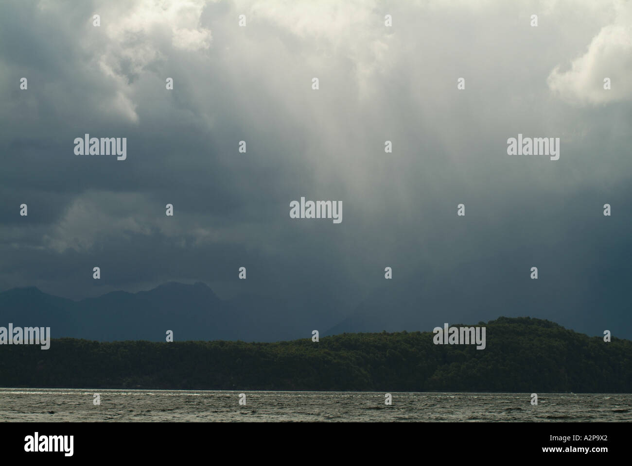 Rain and storm clouds sweep across Lake Manapouri New Zealand Stock ...