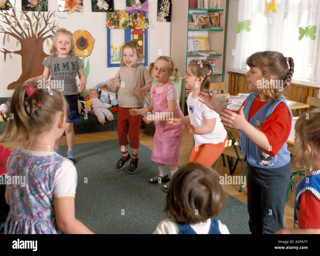 nursery school children dancing kindergarten Stock Photo - Alamy