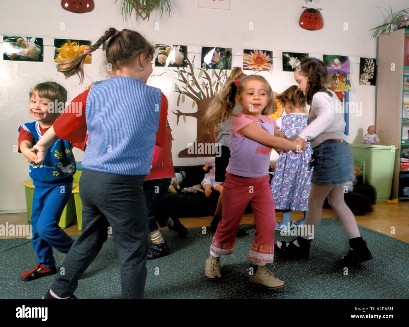 nursery school children dancing kindergarten Stock Photo - Alamy