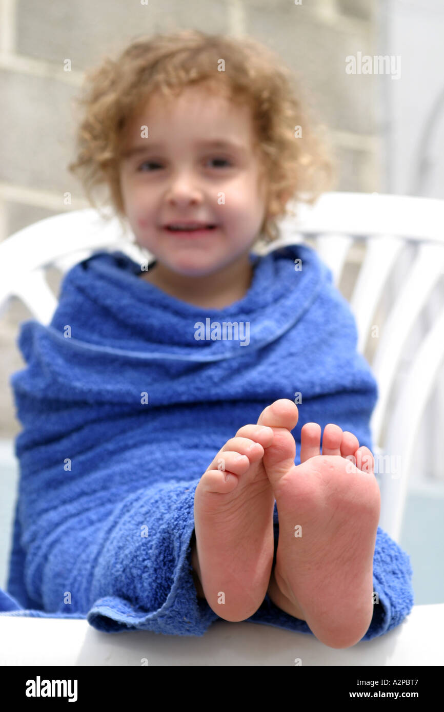 little girl wrapped in towel Stock Photo - Alamy