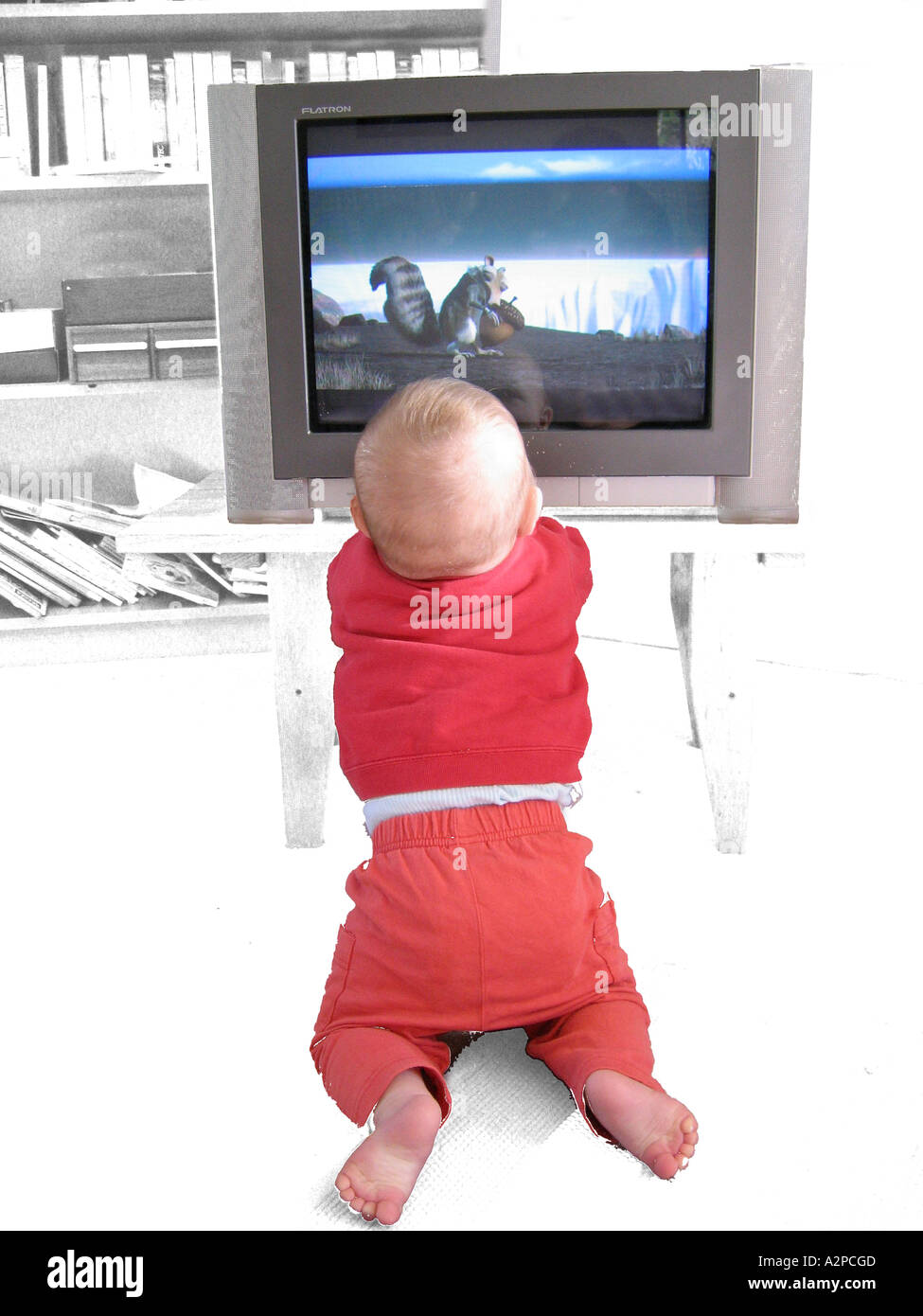 Young child in front of television tv Stock Photo - Alamy