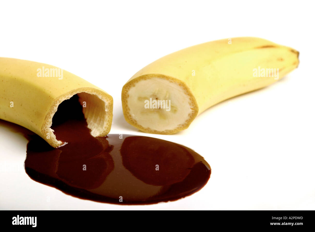 chocolate flowing out of broken banana Stock Photo - Alamy
