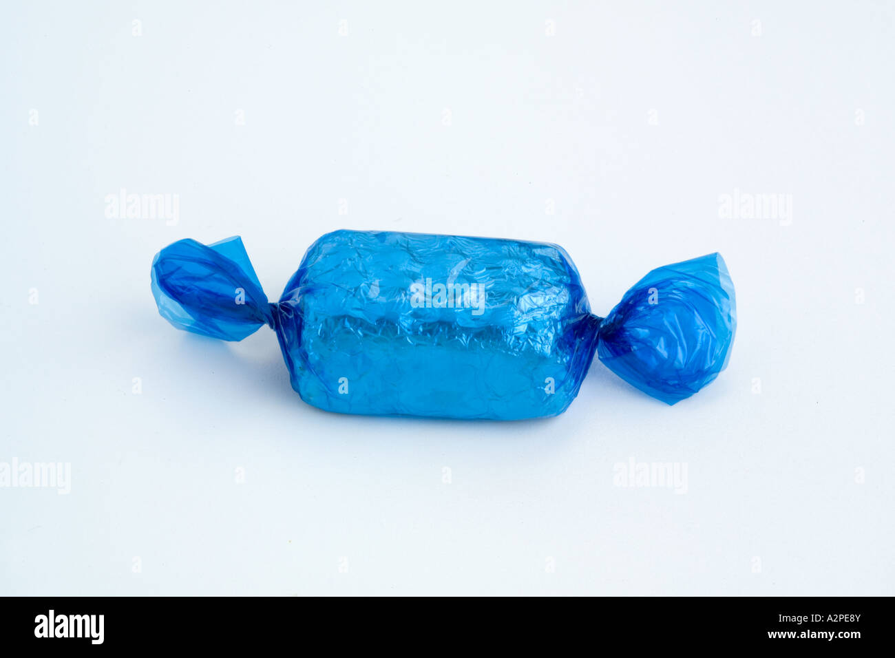Blue coconut rectangular shaped cellophane wrapped sweet Stock Photo ...