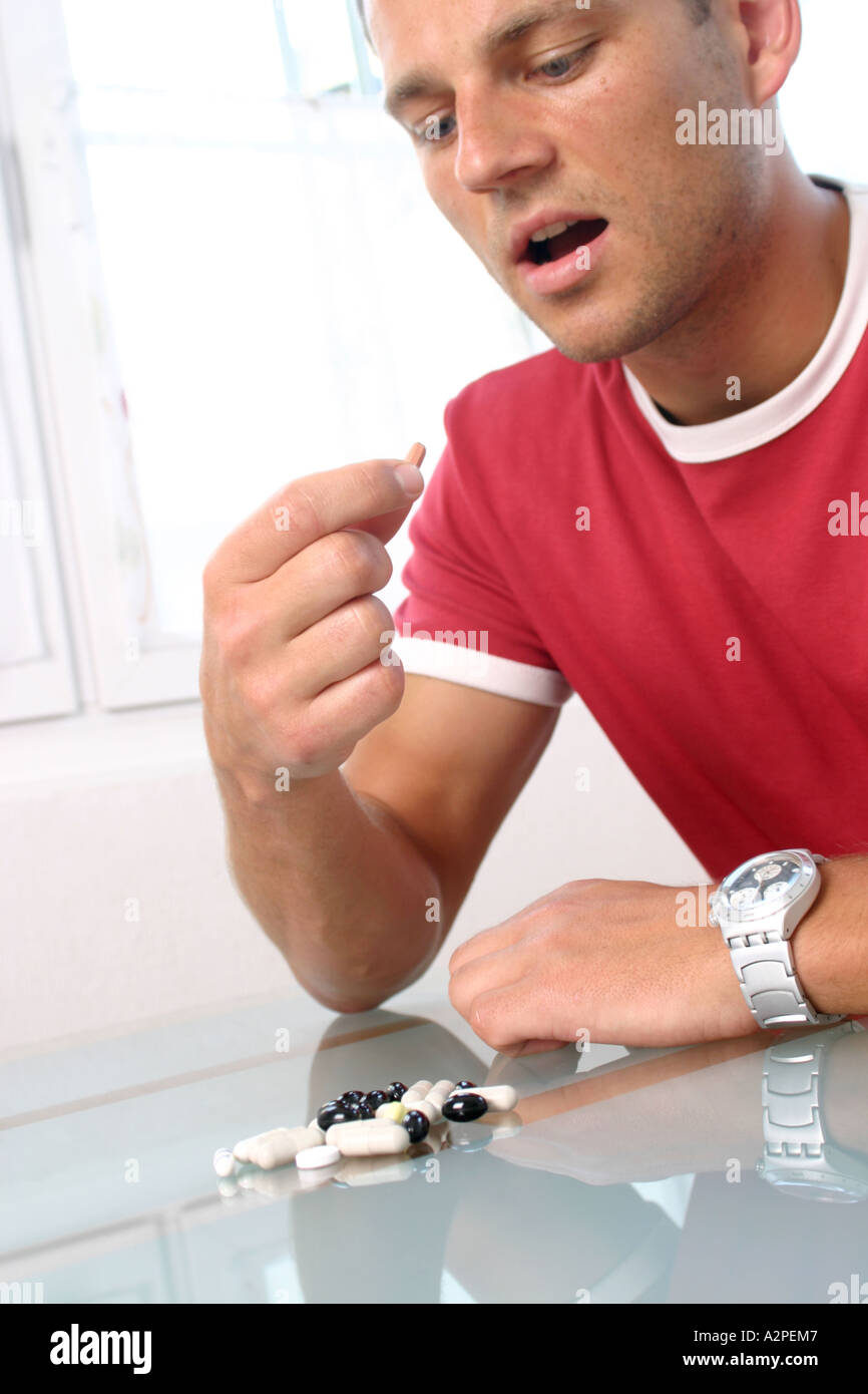 man taking drugs Stock Photo - Alamy