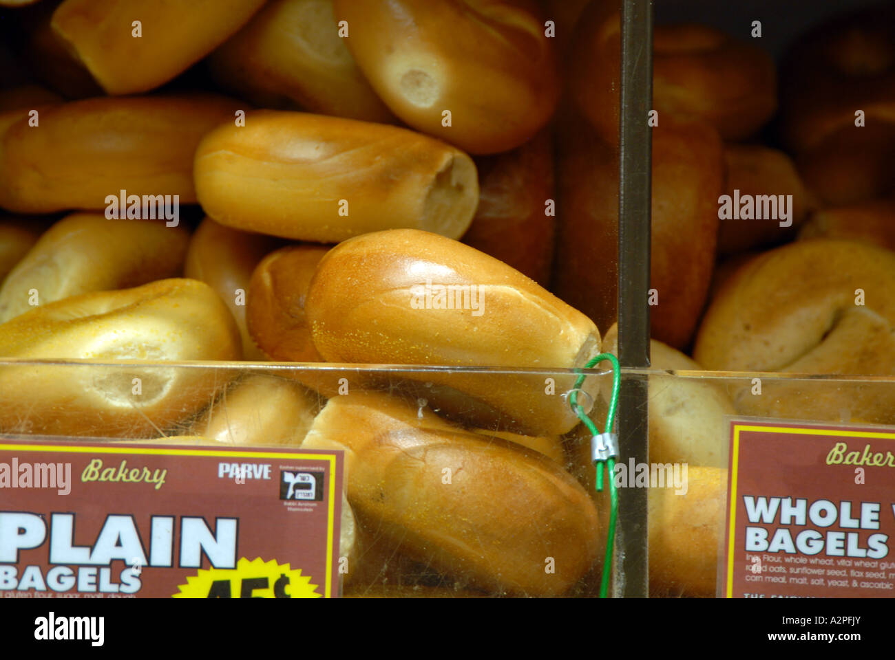 Plain bagels in a food market display case Stock Photo - Alamy
