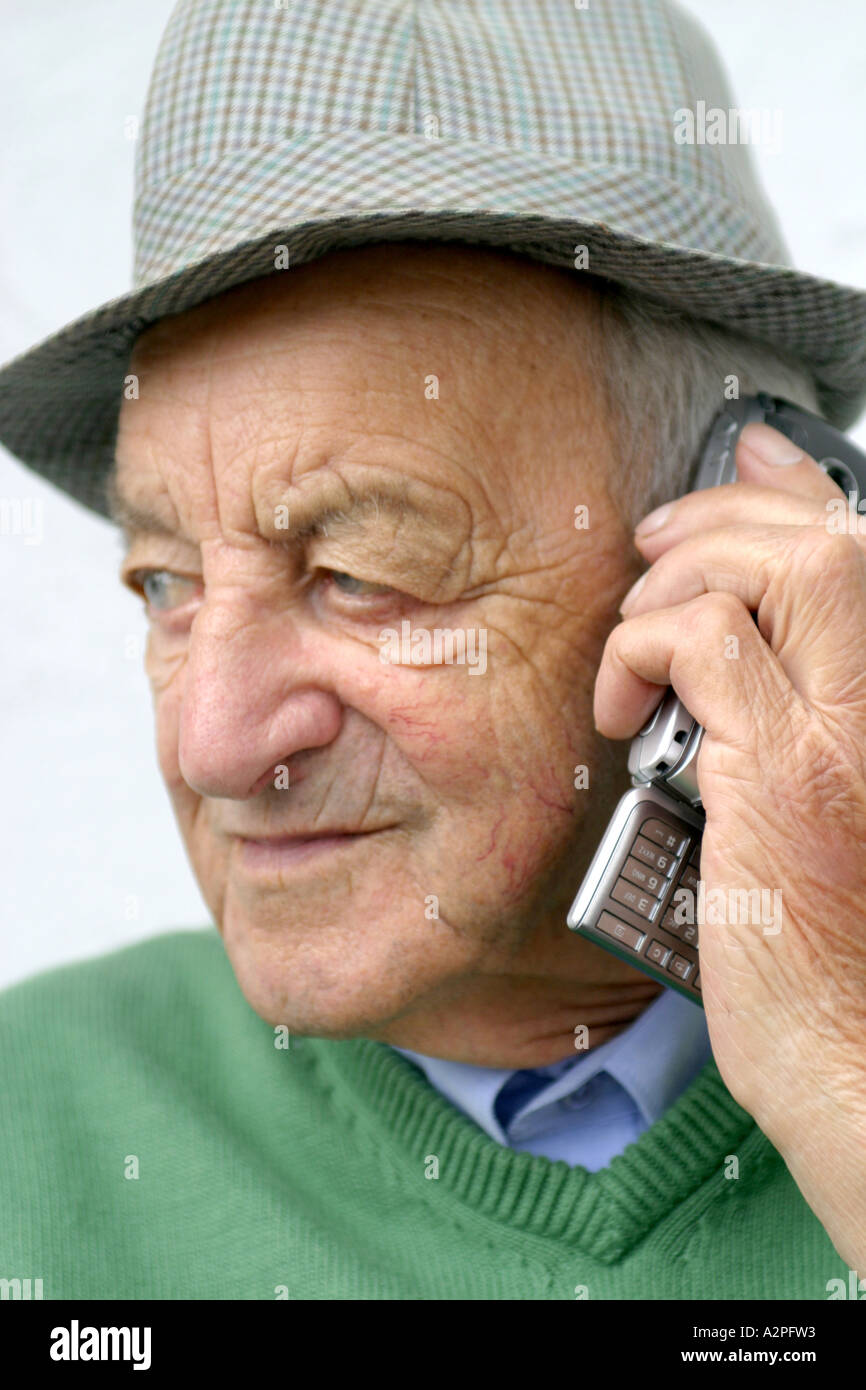 old man with mobile phone / PDA Stock Photo - Alamy