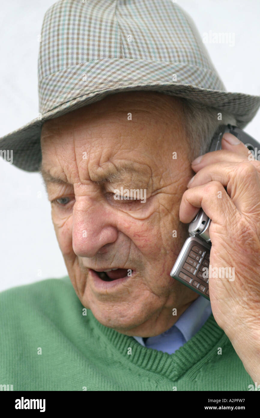 old man with mobile phone / PDA Stock Photo - Alamy