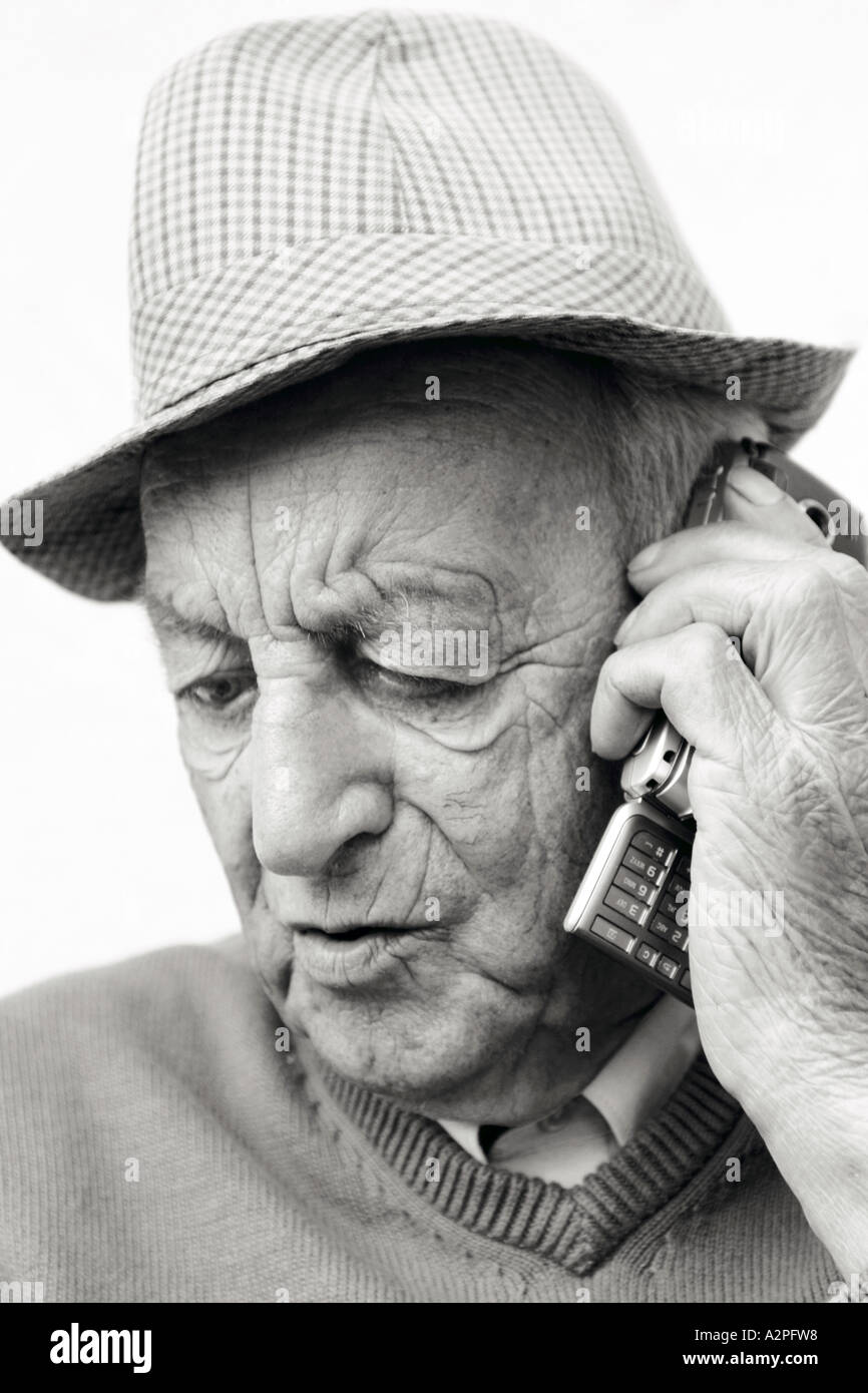 old man with mobile phone / PDA Stock Photo - Alamy