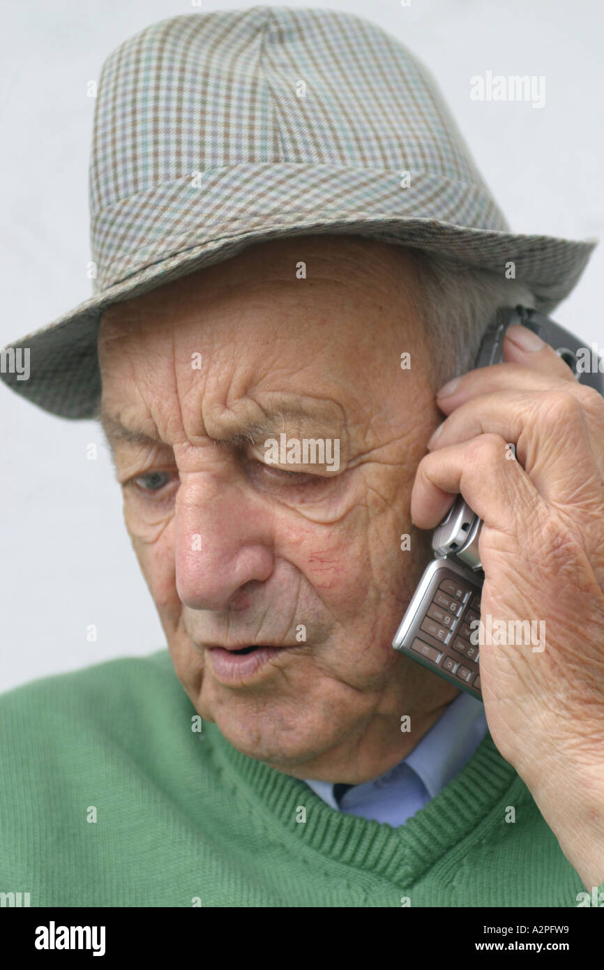 old man with mobile phone / PDA Stock Photo - Alamy