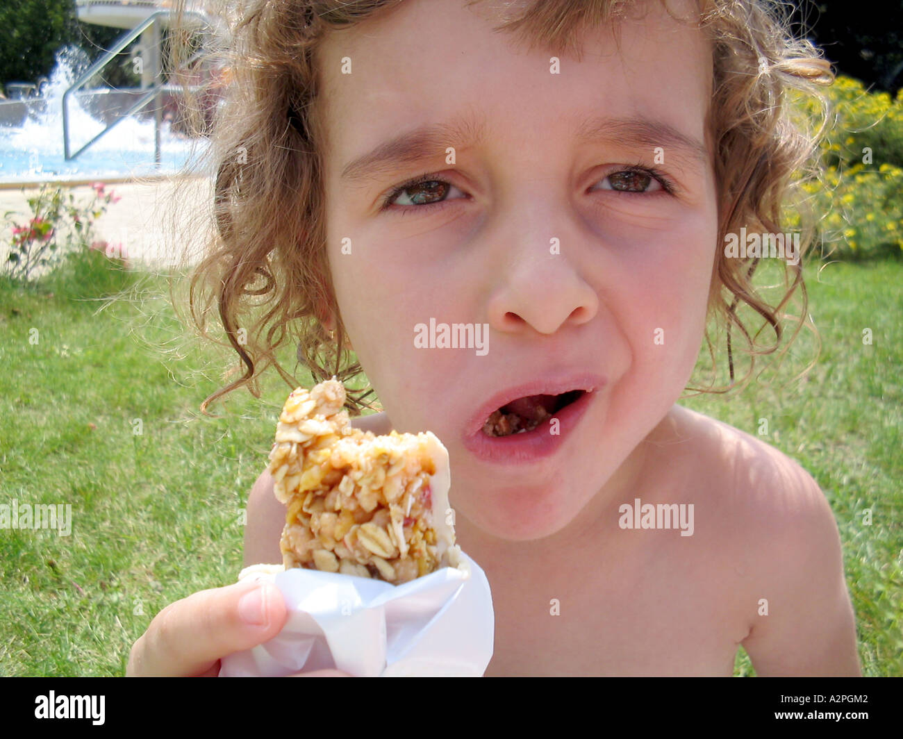 little girl with snack Stock Photo - Alamy