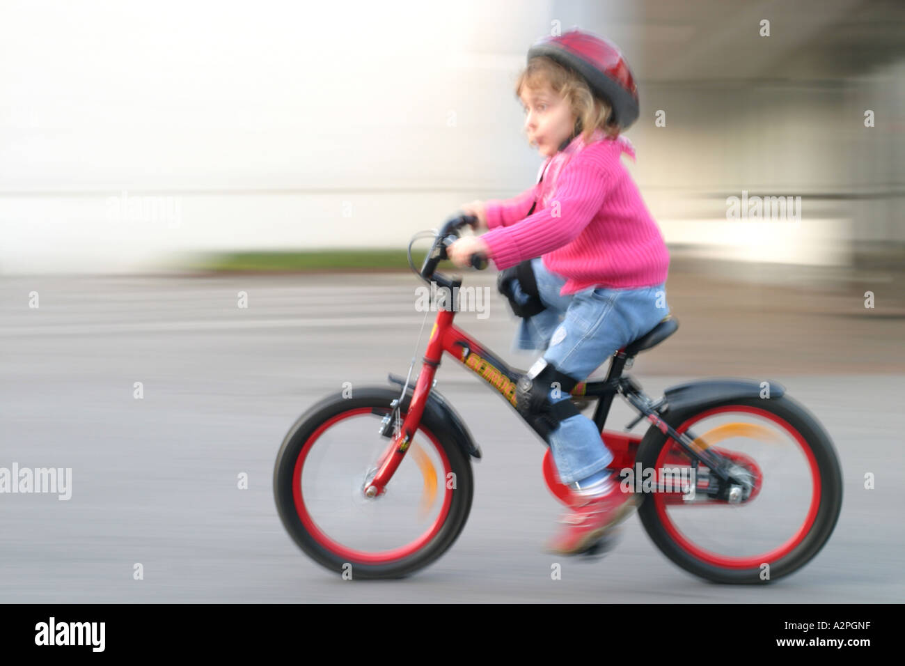 little girl on bicycle Stock Photo - Alamy