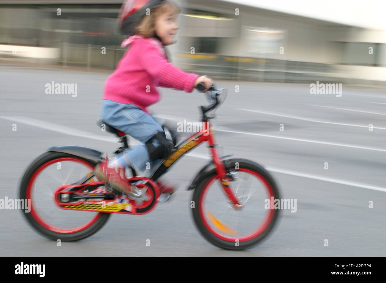 little girl on bicycle Stock Photo - Alamy