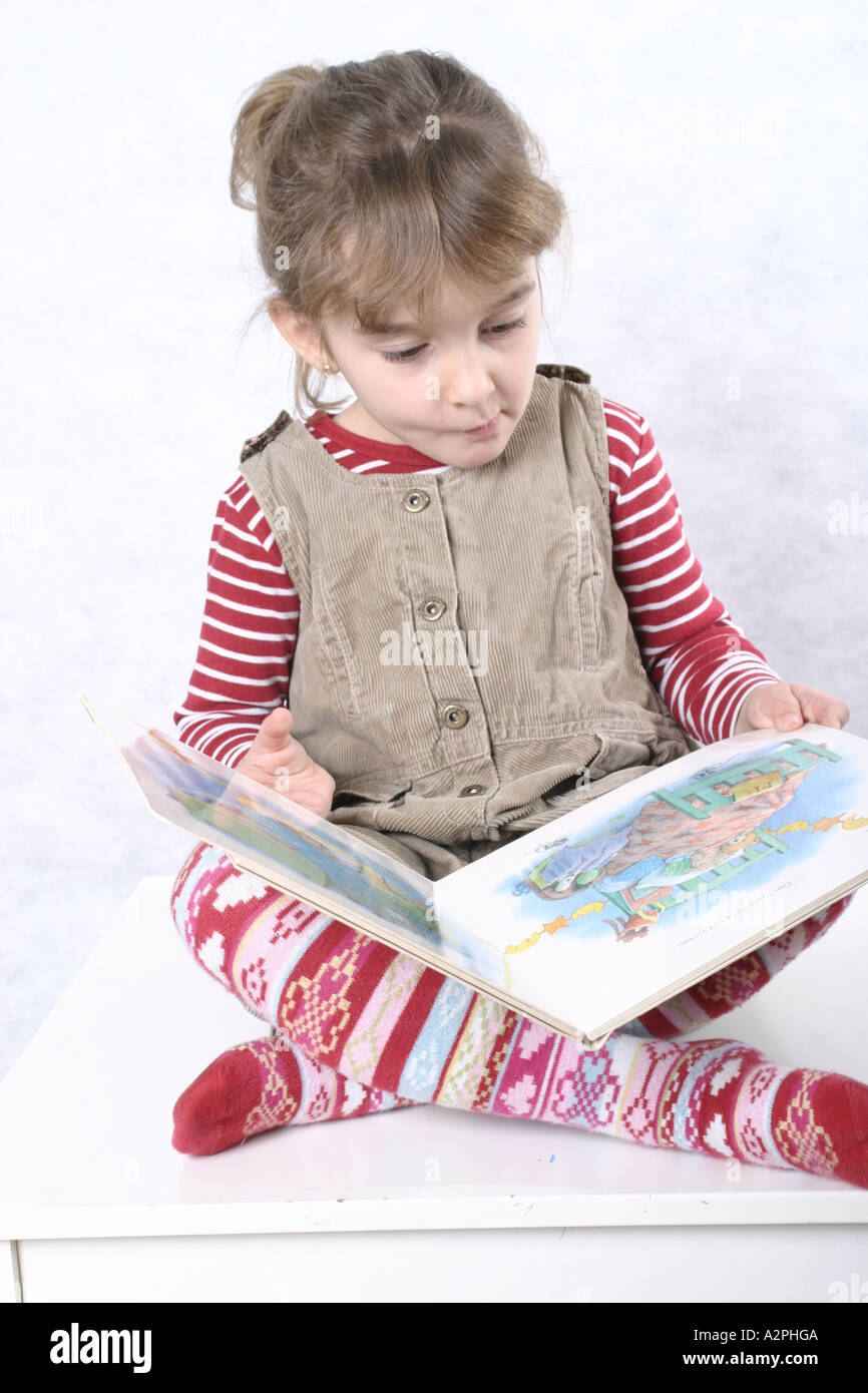 little girl with book Stock Photo - Alamy