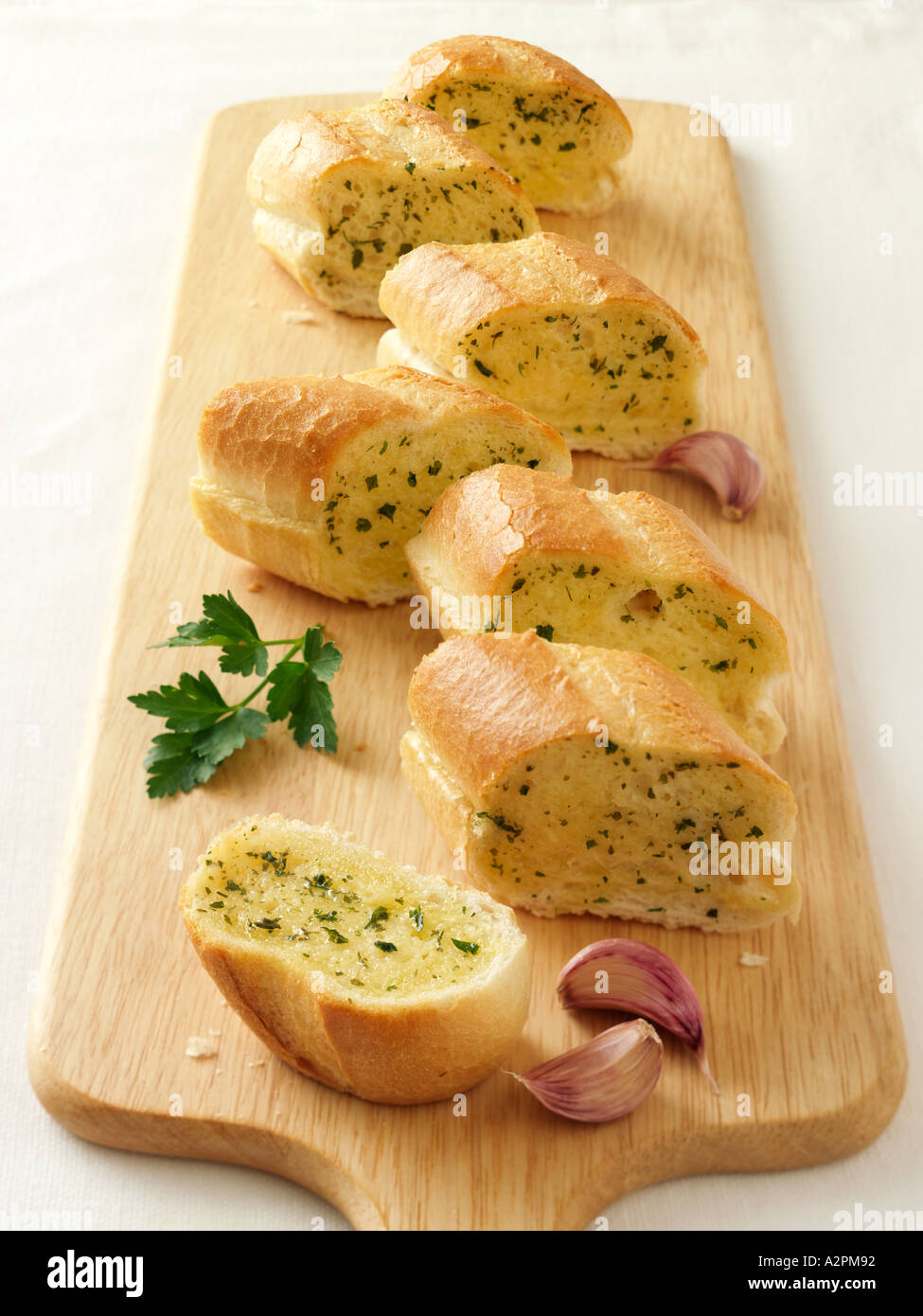 garlic bread with chopped parsley Stock Photo - Alamy