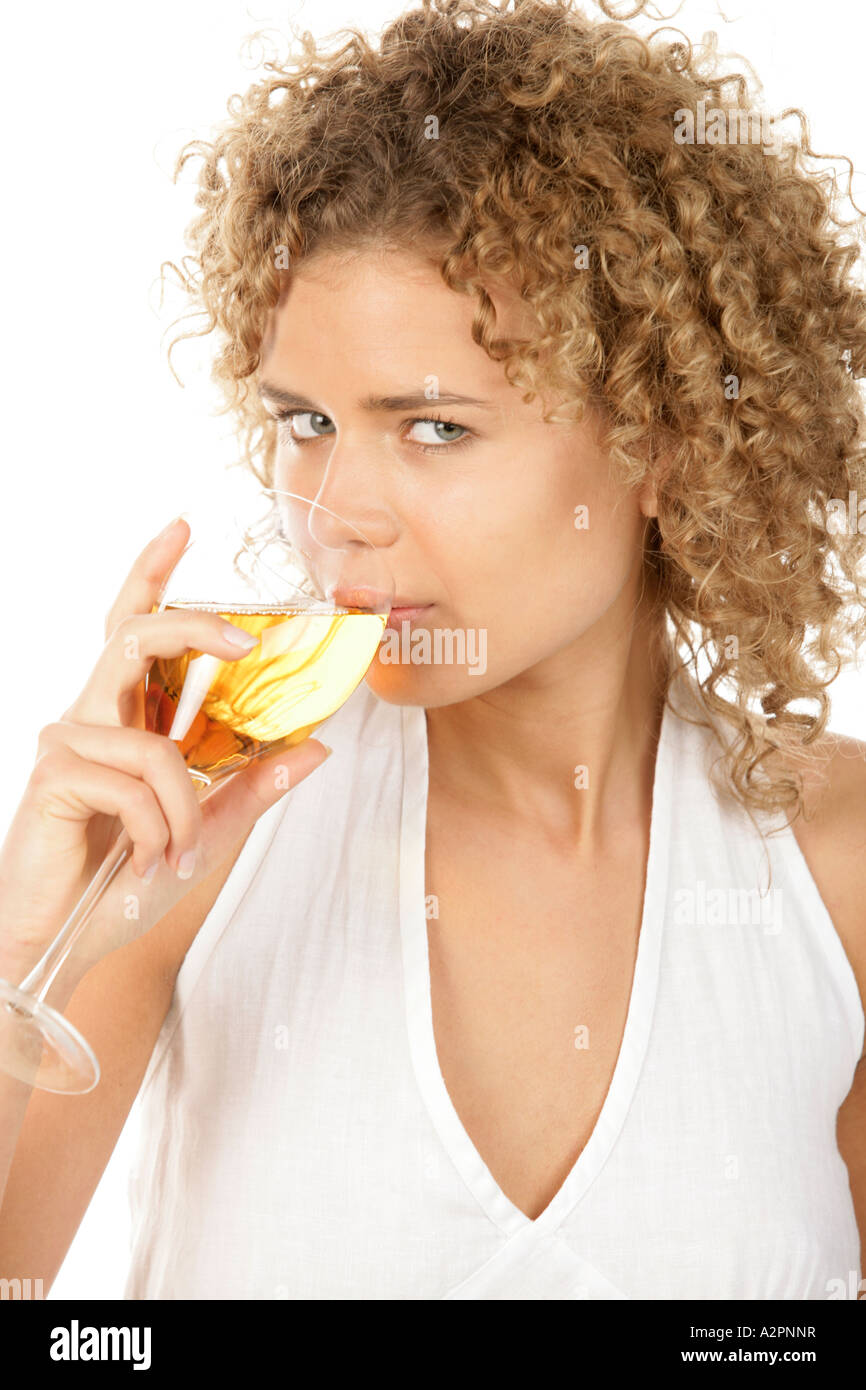 Woman drinking white wine Stock Photo - Alamy