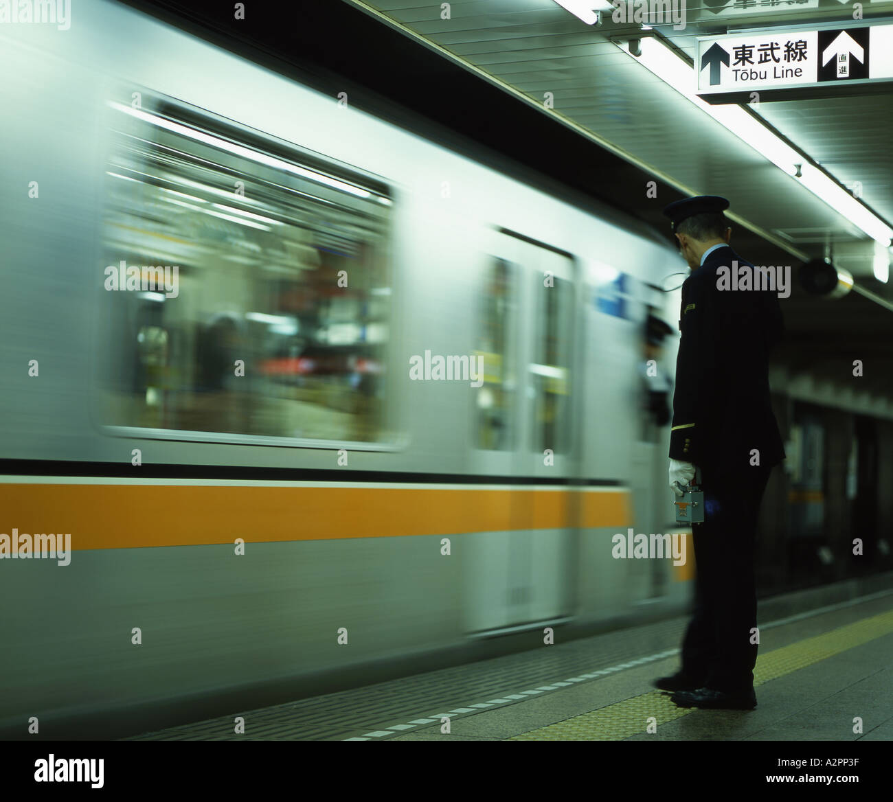 Conductor on Tokyo Metro Stock Photo - Alamy