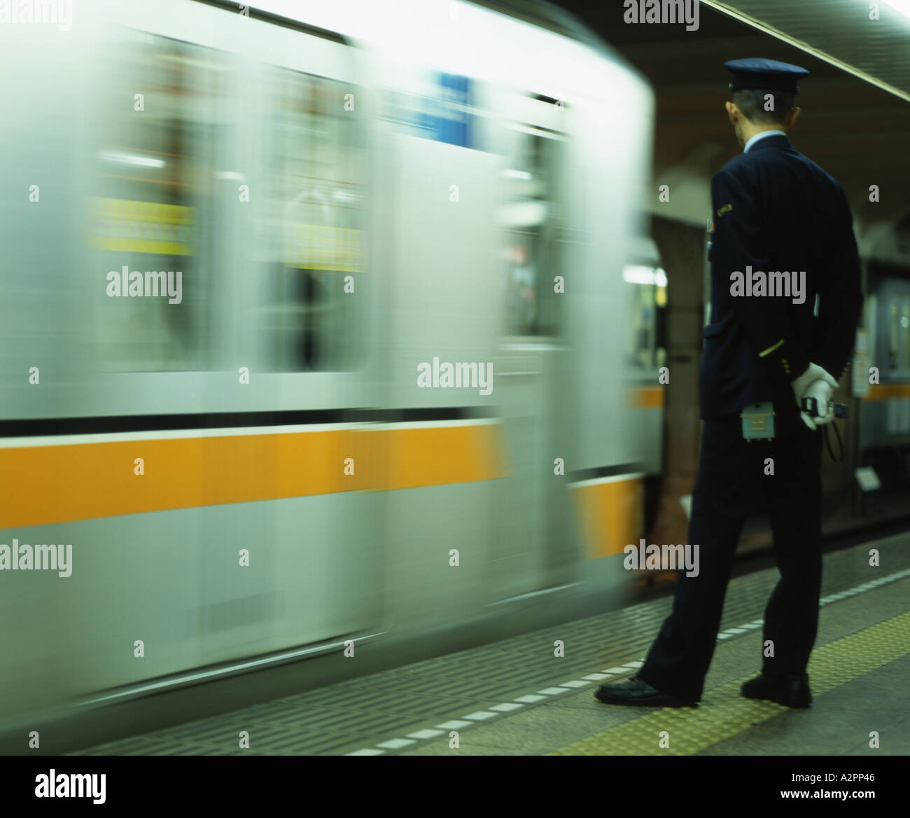 Conductor on Tokyo Metro Stock Photo - Alamy